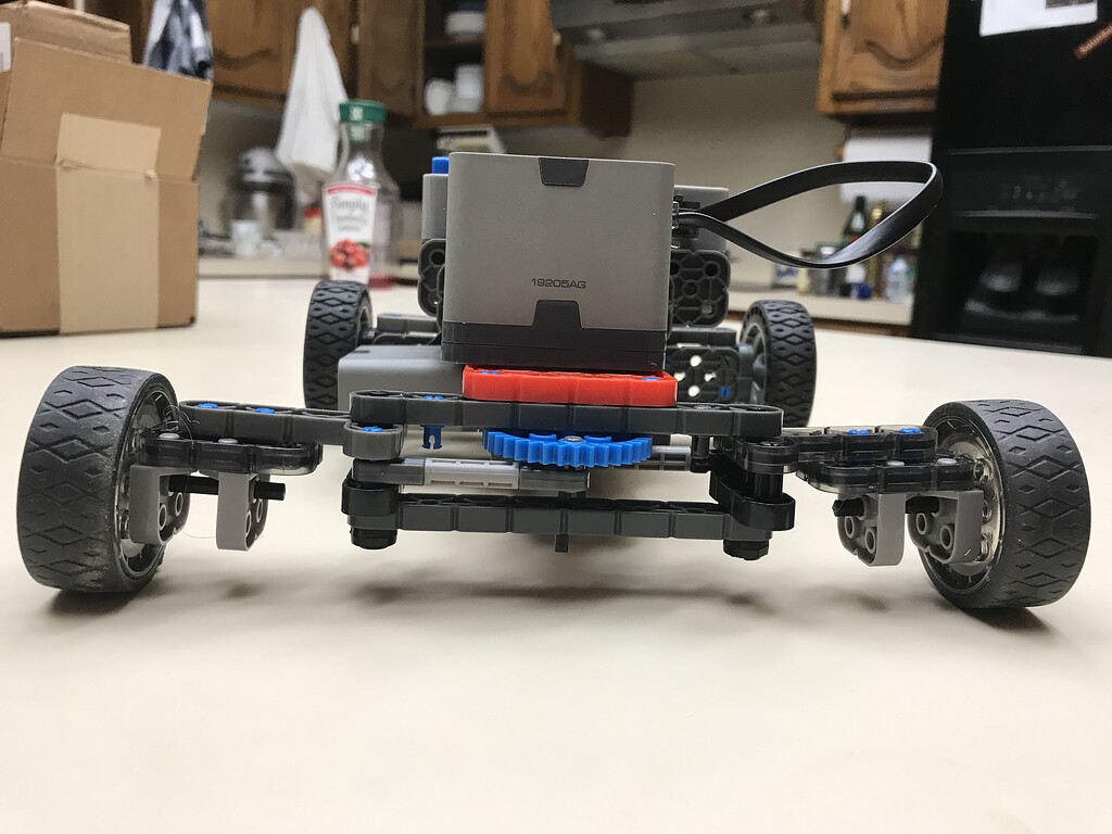 My four wheel bot with gear driven design to turn the front wheels ...